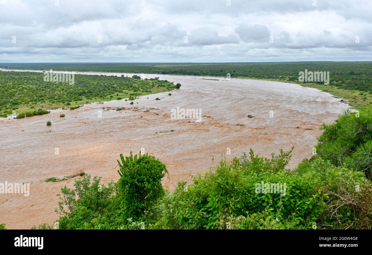 storm clouds and flooding Olifants River in Kruger National Park, South ...