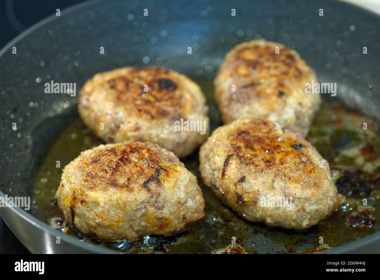 Raw cutlets made of ground beef meat. coocking process Stock Photo - Alamy