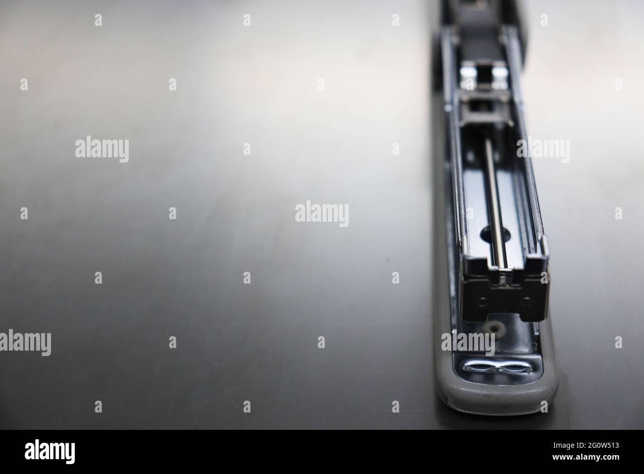 A stapler is a mechanical device that joins pages of paper or similar ...