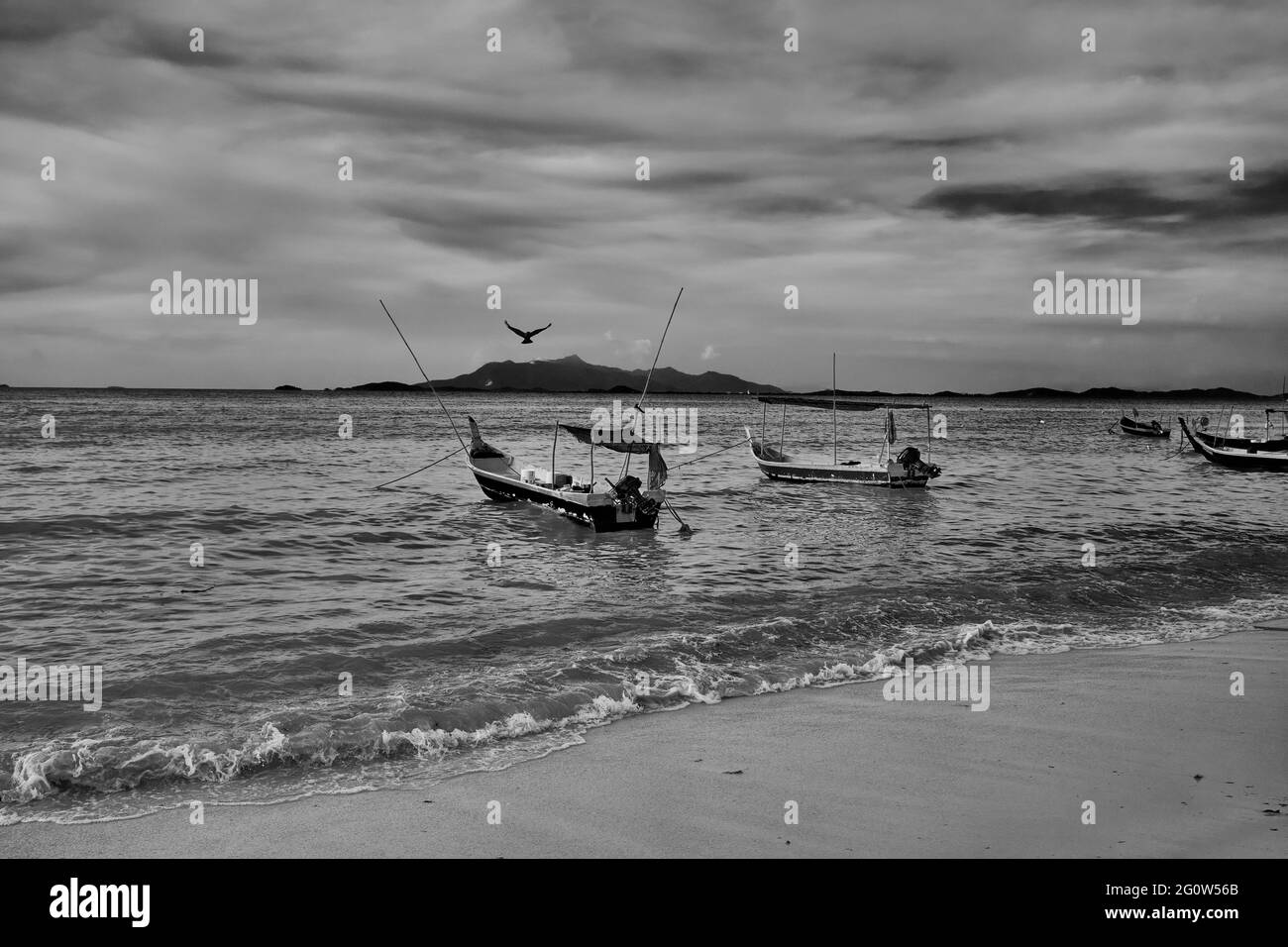 Boat on sea over Black and White Stock Photos & Images - Alamy