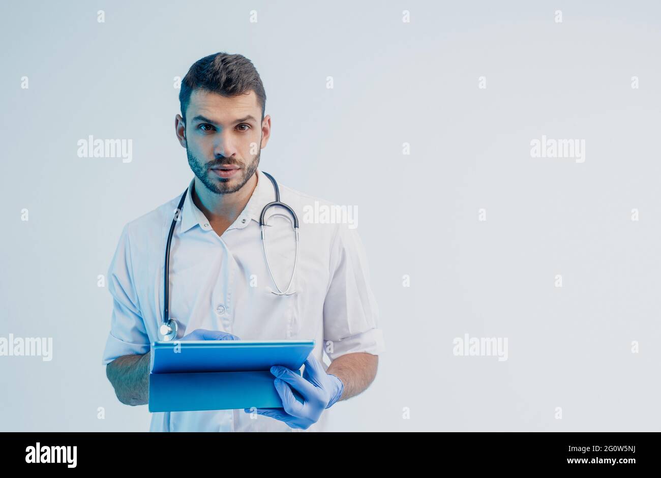 Professional caucasian doctor beard gloves hi-res stock photography and ...