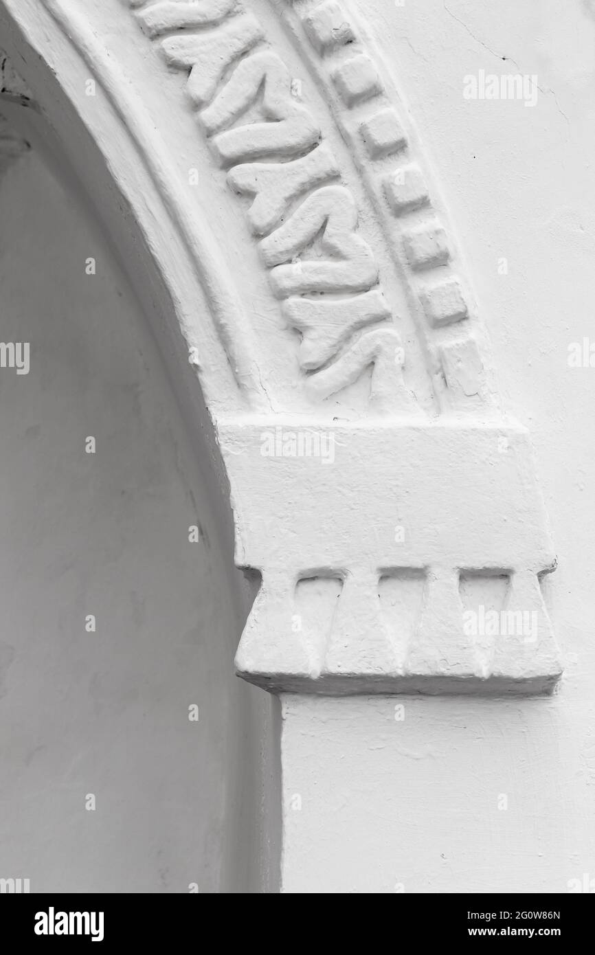 Vertical architectural background with an arch in a white wall. Ancient ...