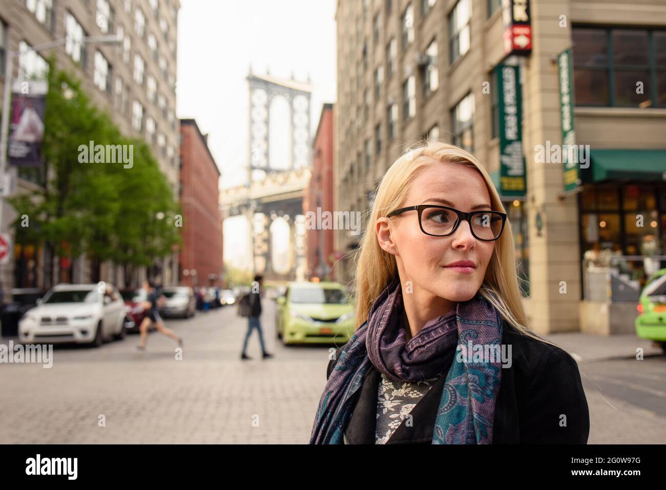 Woman standing roadside hi-res stock photography and images - Alamy