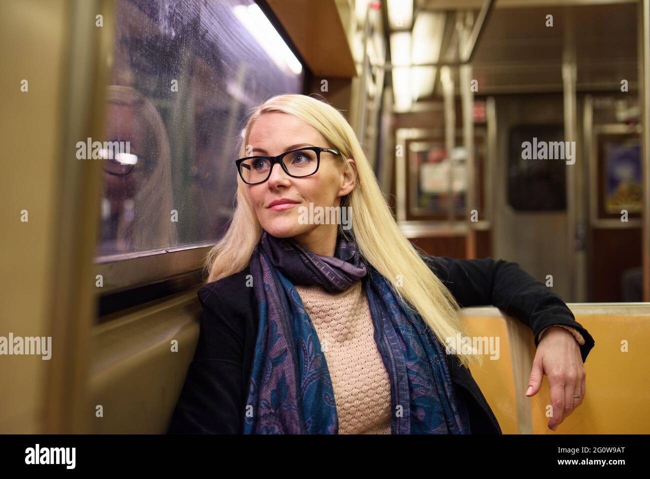 Woman riding wagon hi-res stock photography and images - Alamy