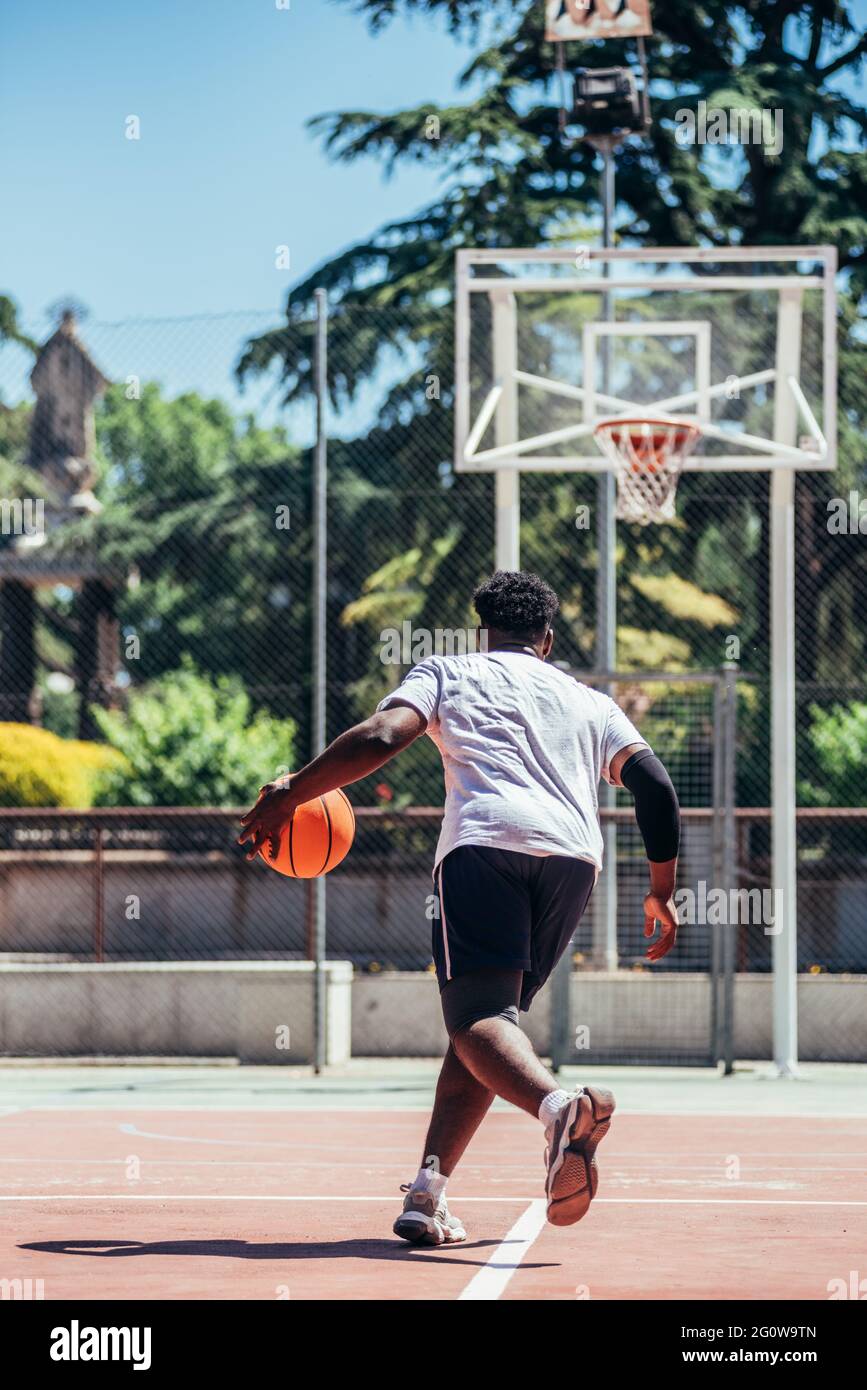 African american boy running hi-res stock photography and images - Alamy