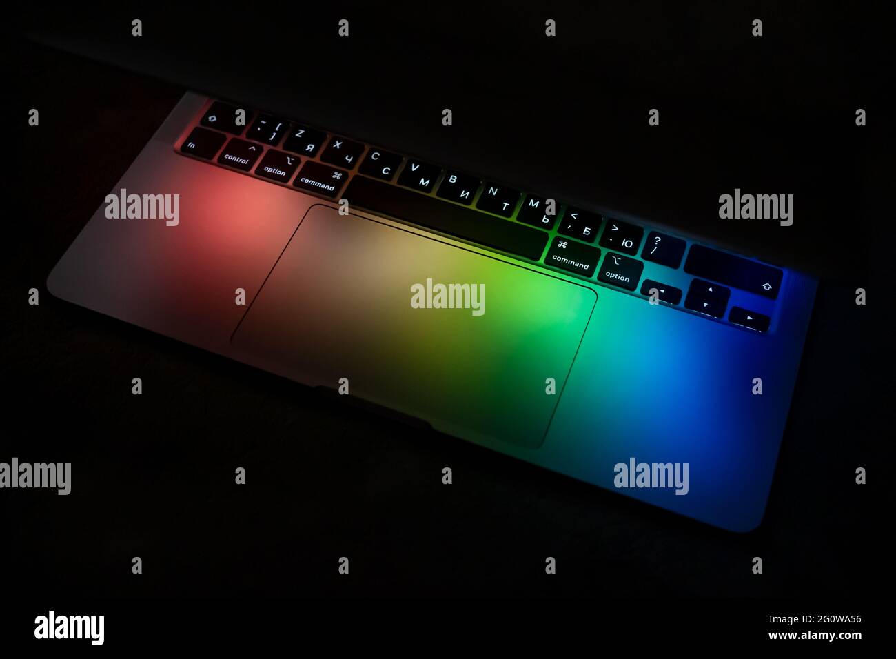 Lapton screen light on the touchpad Stock Photo - Alamy