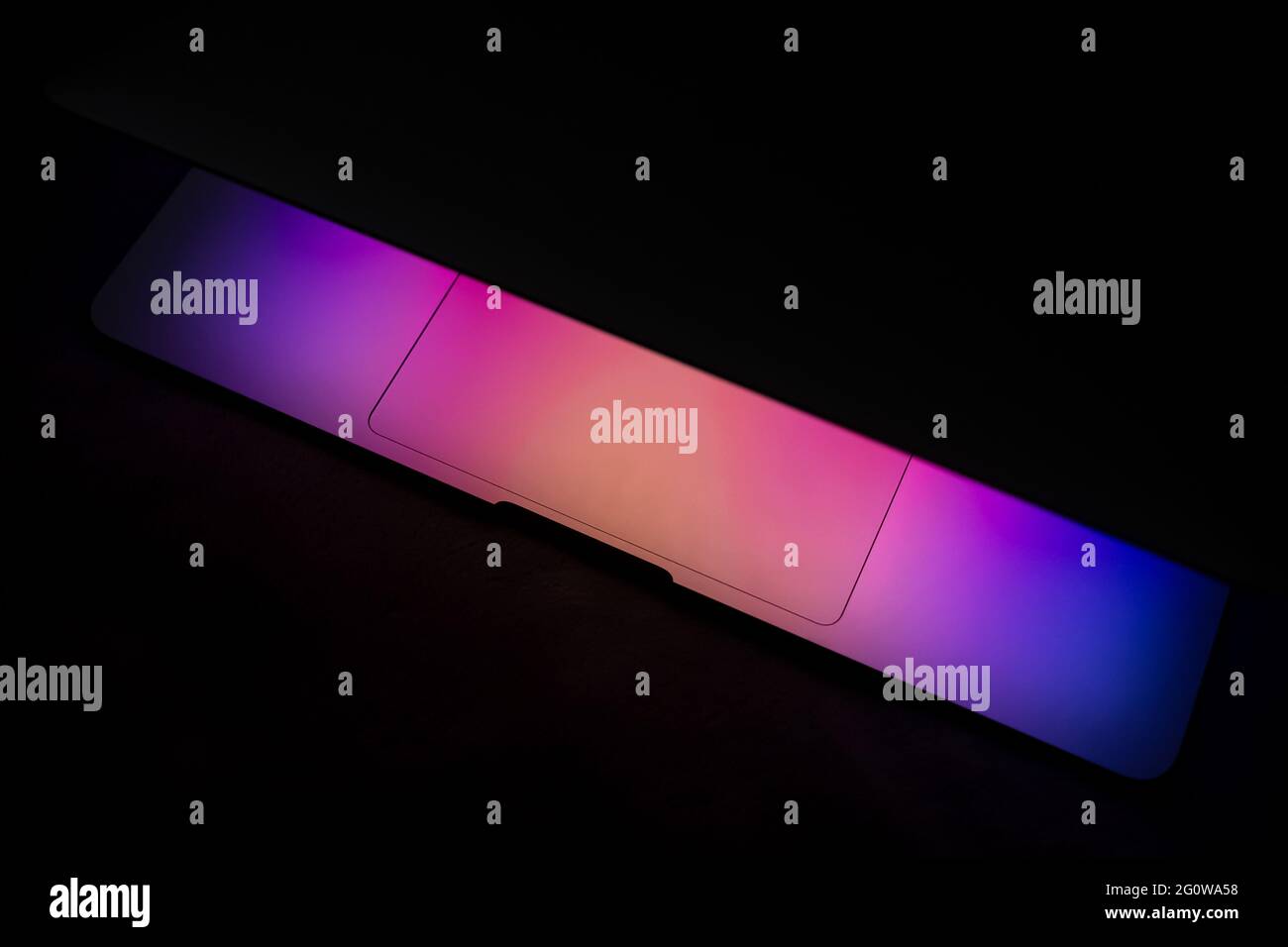 Lapton screen light on the touchpad Stock Photo - Alamy