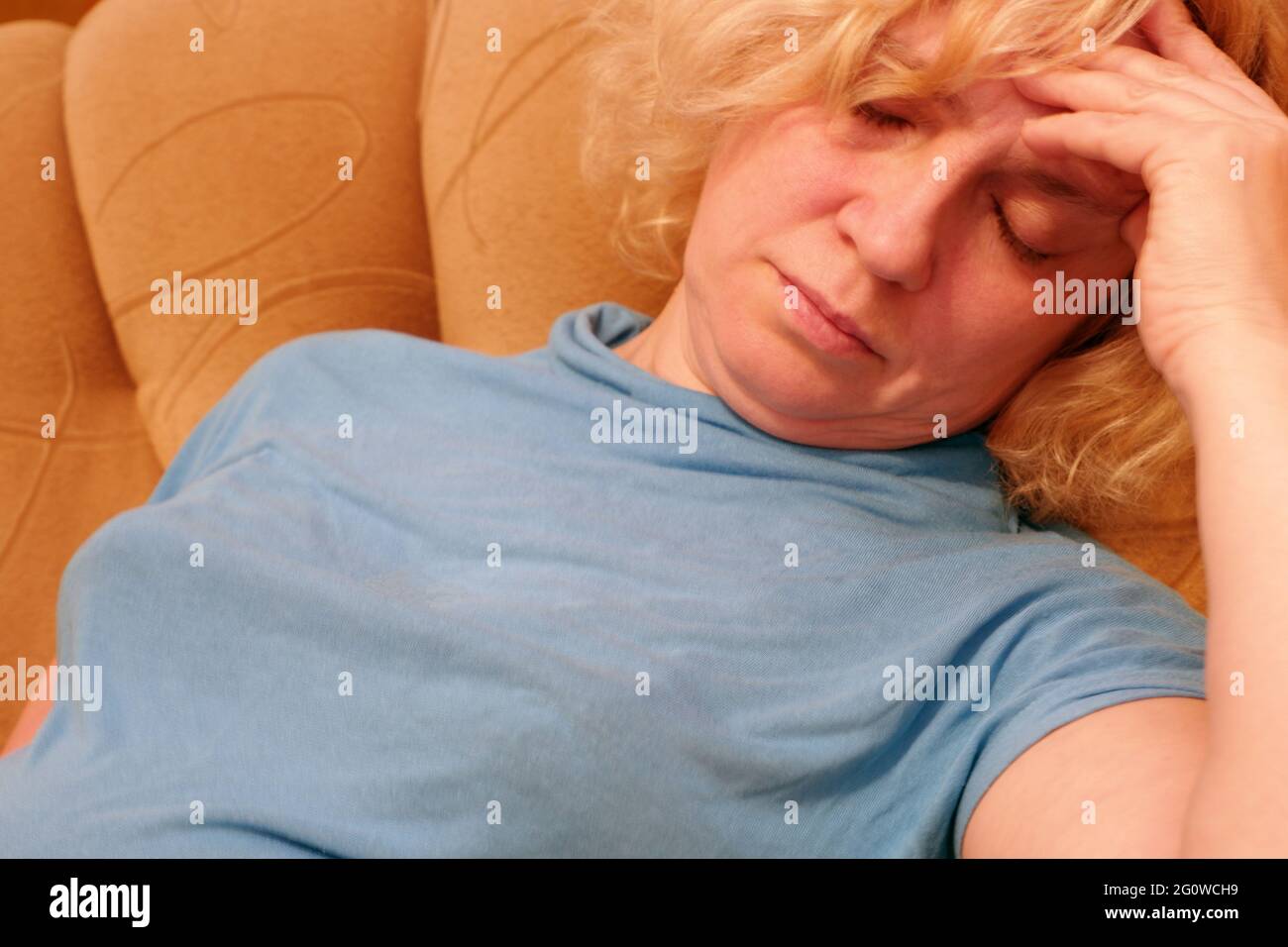 Woman asleep chair hi-res stock photography and images - Alamy