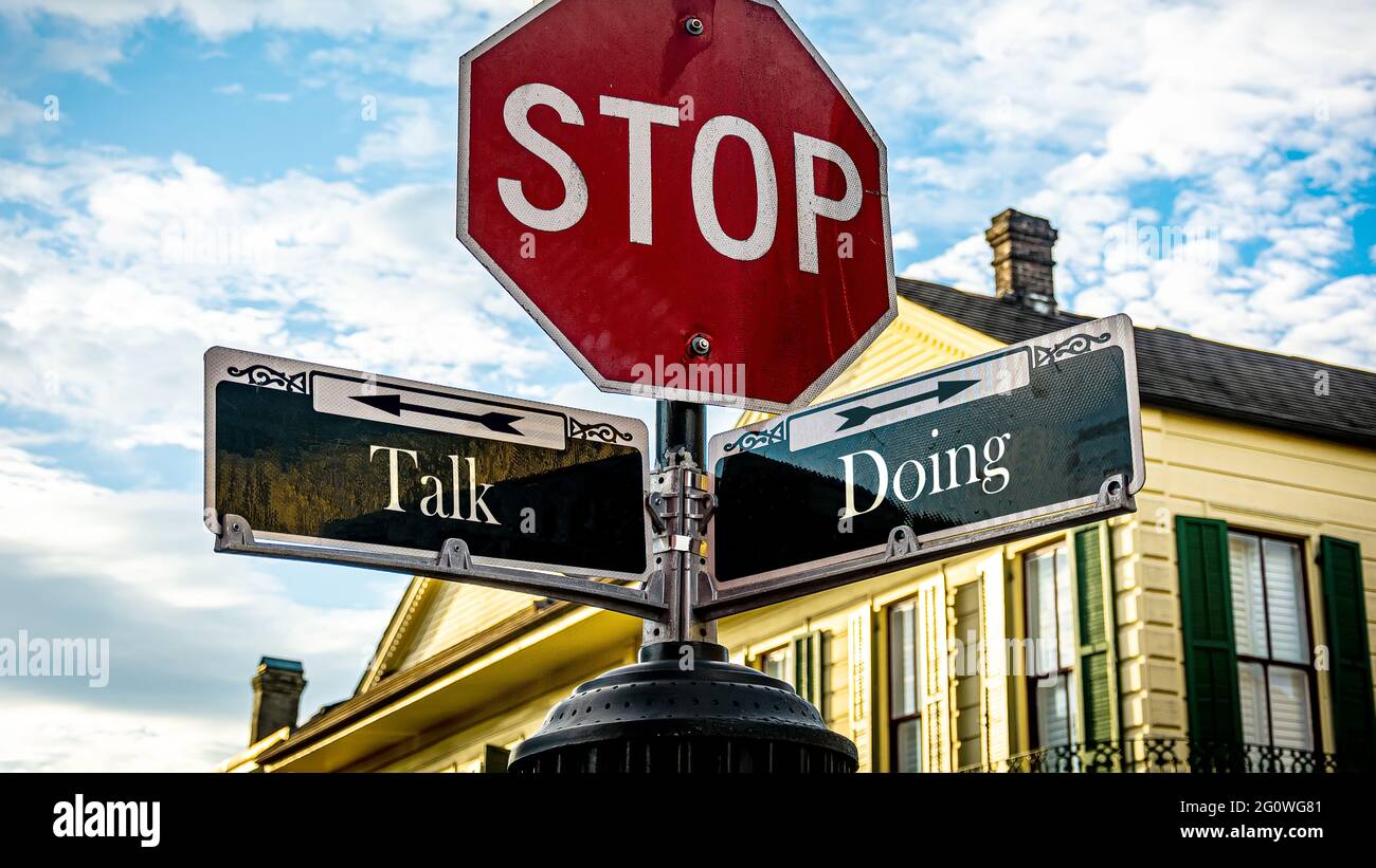 Street Sign the Direction Way to Doing versus Talk Stock Photo - Alamy