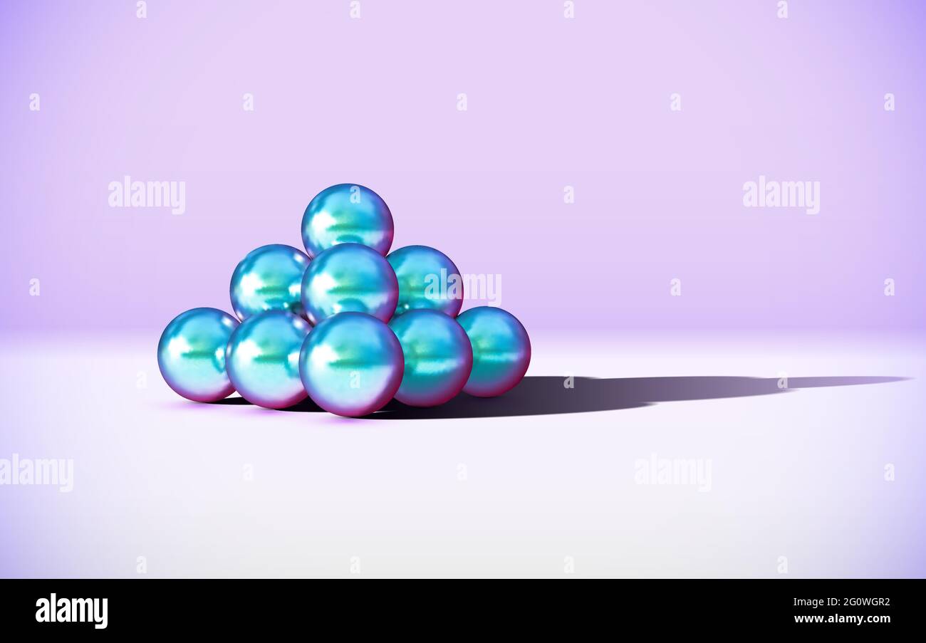 Chrome metal balls in pyramid stack with abstract calm and relaxing ...