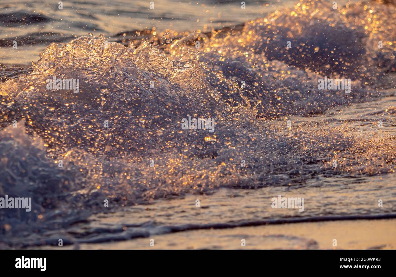 wave splash sea beach macro, close up Stock Photo - Alamy