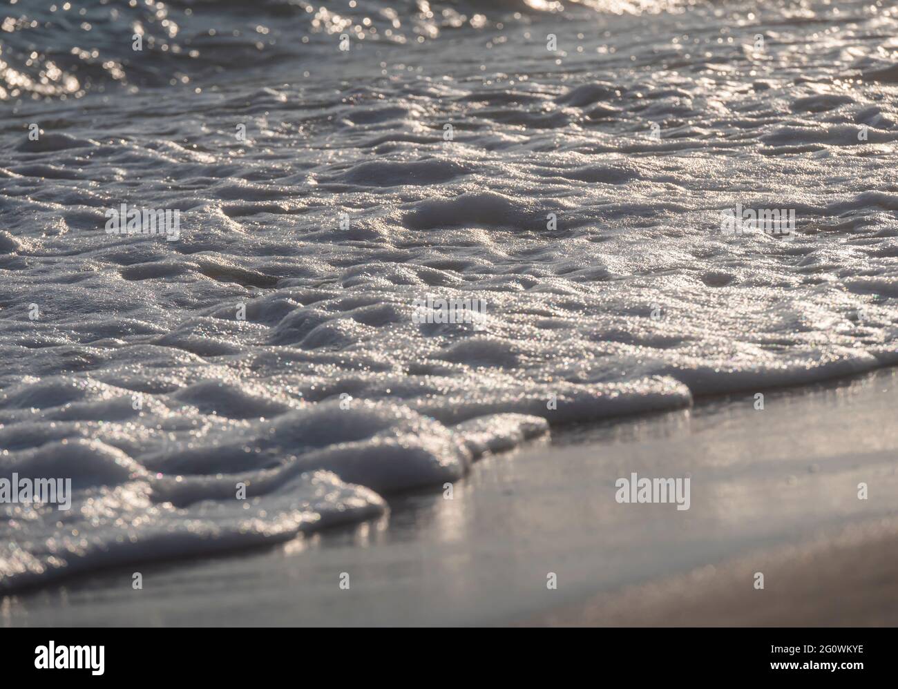 wave splash sea beach macro, close up Stock Photo - Alamy