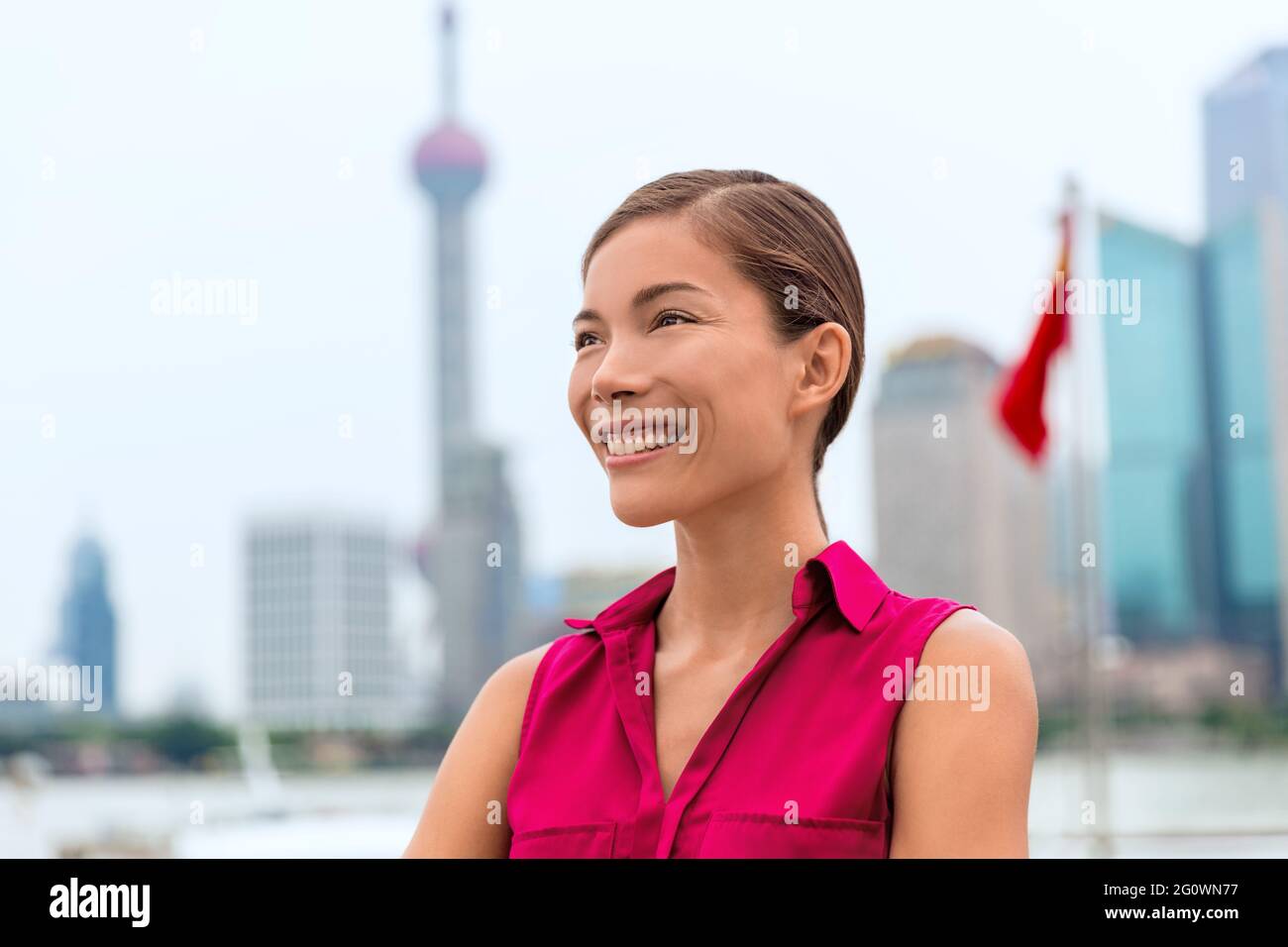 Business woman portrait in Shanghai China showing Pudong financial ...