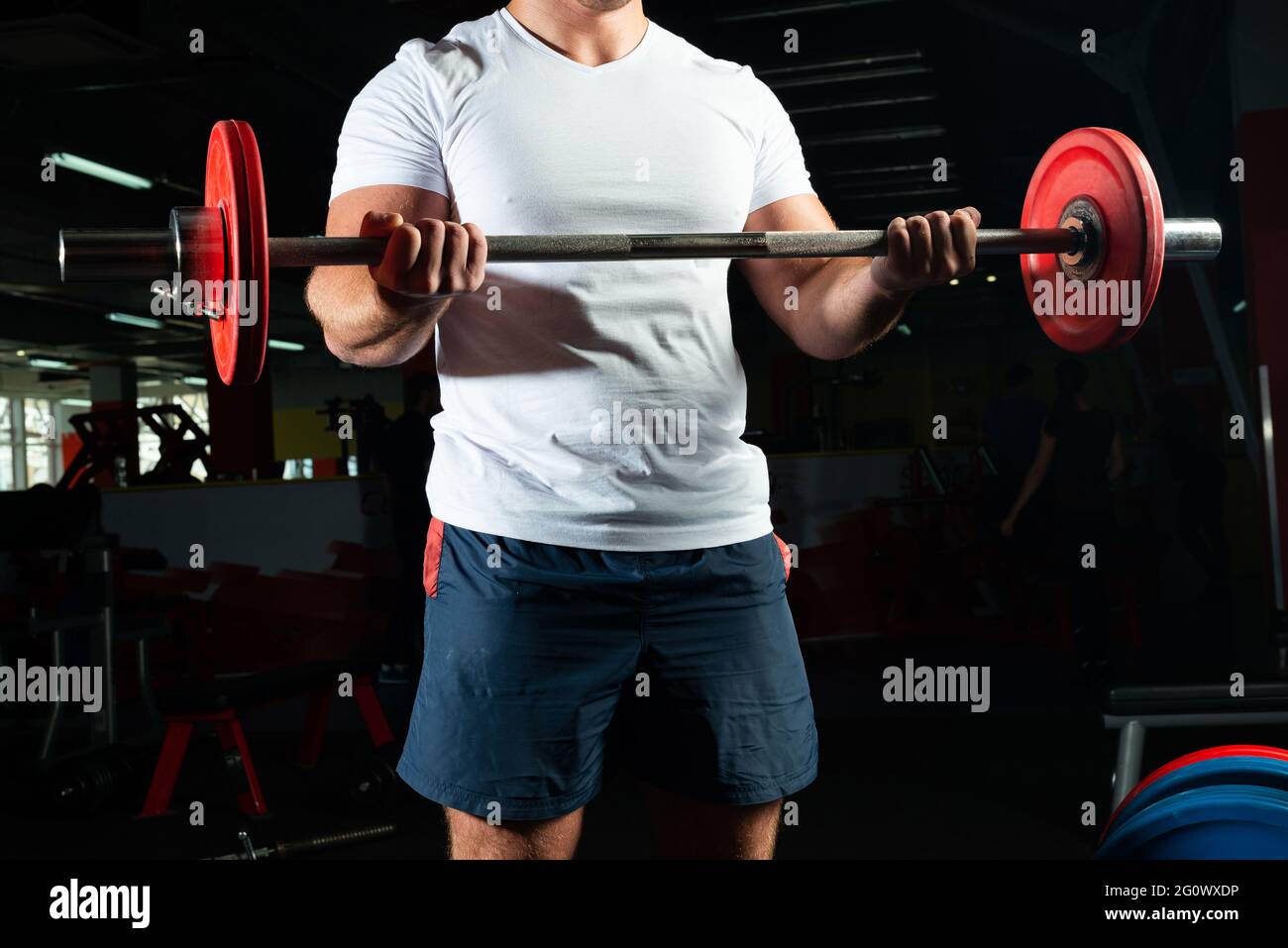 Young male athlete lifts barbell hi-res stock photography and images ...