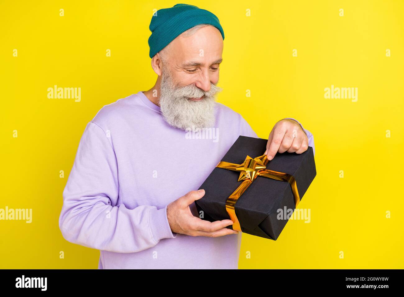 Photo of handsome cute mature man dressed purple pullover headwear ...