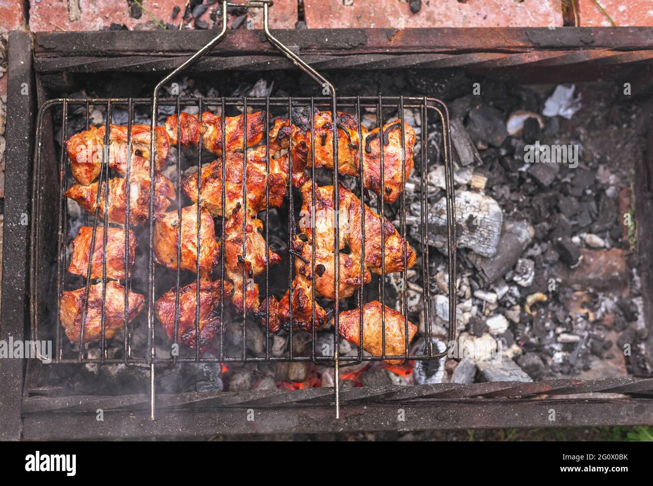 toasted meat skewers on grill. backyard barbecues Stock Photo - Alamy