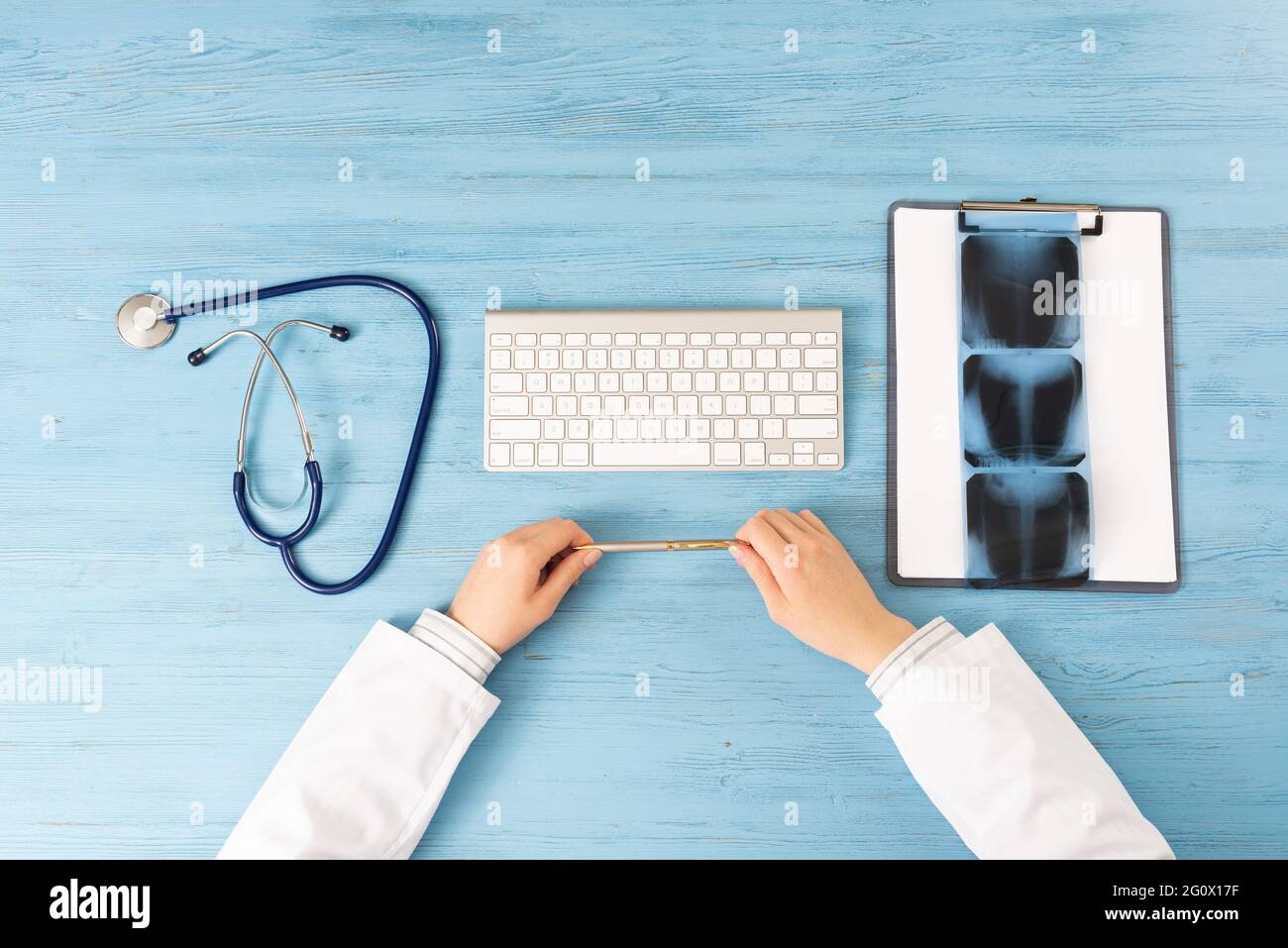Top view of doctor hands holding pen Stock Photo - Alamy