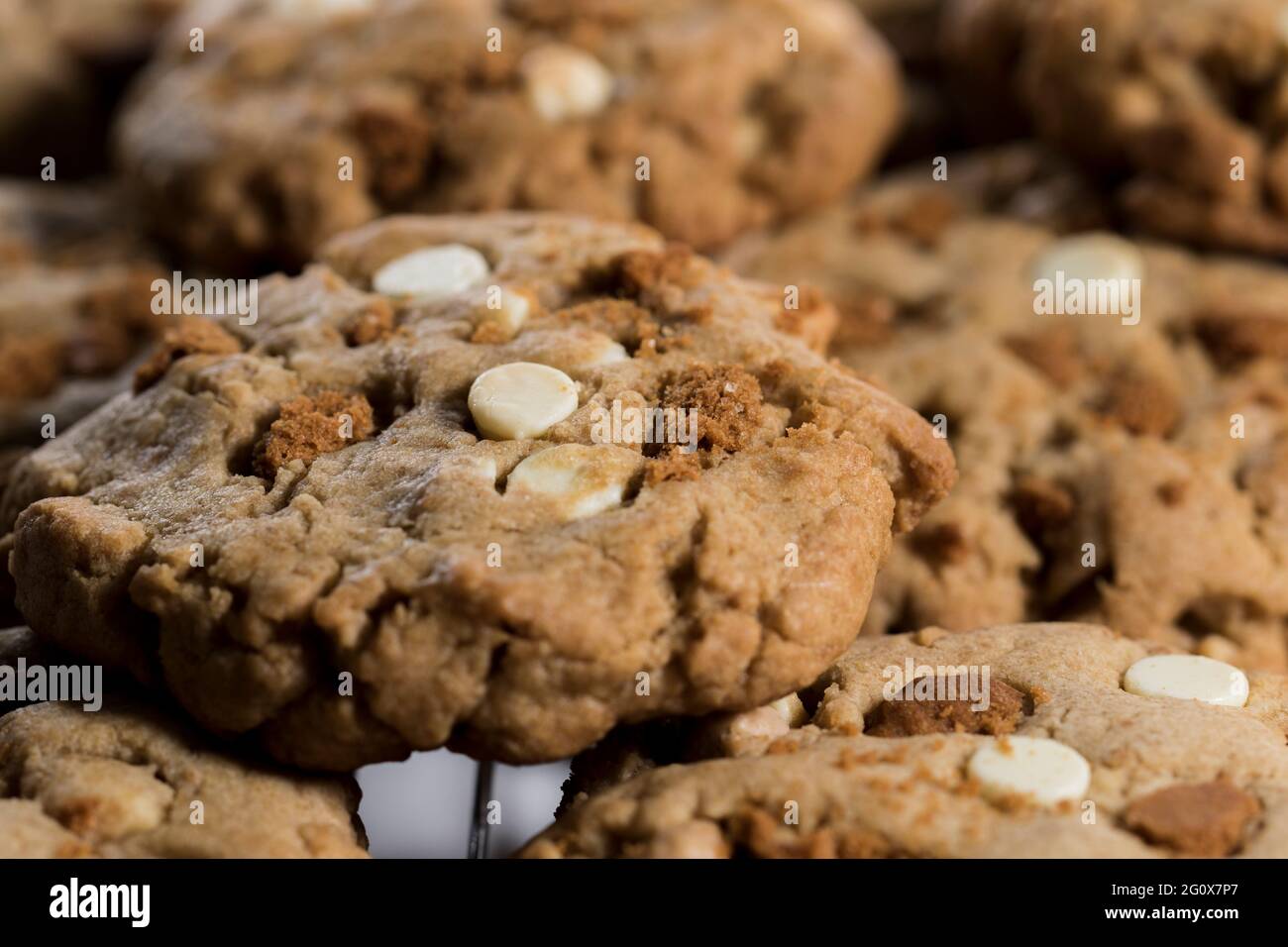 Delicious food close up cookies cooling off on baking rack after being ...