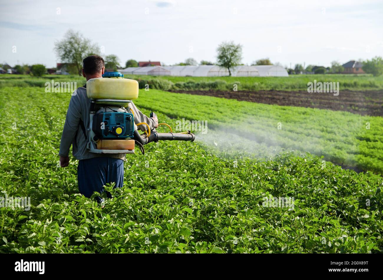 Pesticides farming hi-res stock photography and images - Alamy