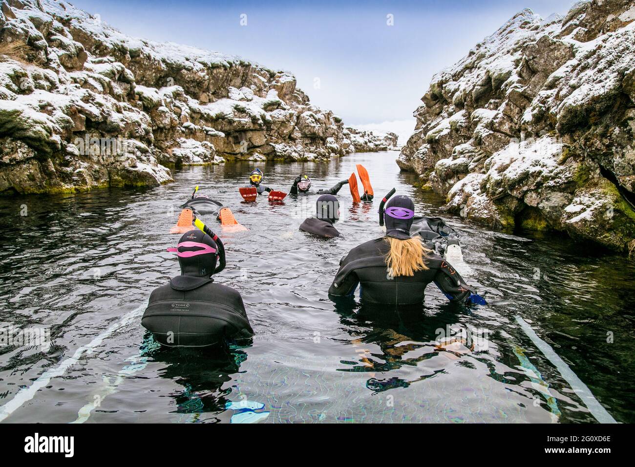 Silfra, Iceland-Feb 19, 2020: Snorkelers preparing entering in the ...