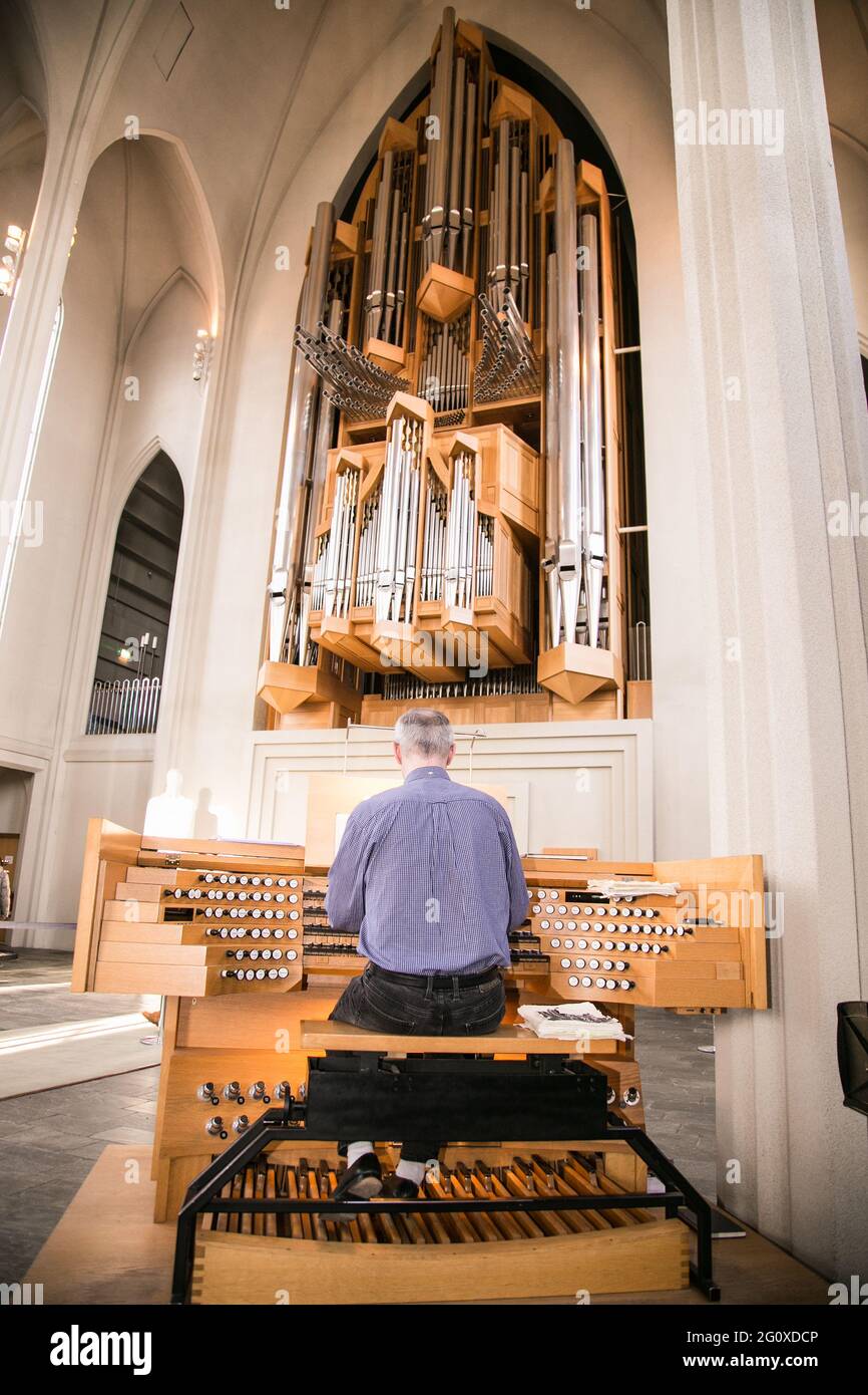 Reykjavik, Iceland - Feb 20 2020: Musician play Pipe Organ inside ...