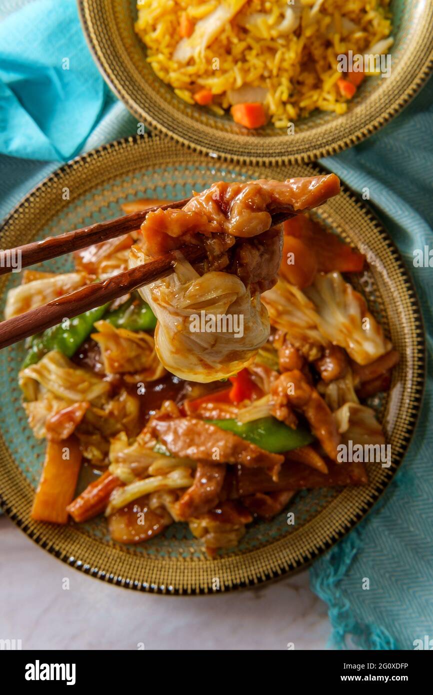 Chinese cuisine double cooked pork with cabbage and chicken fried rice ...