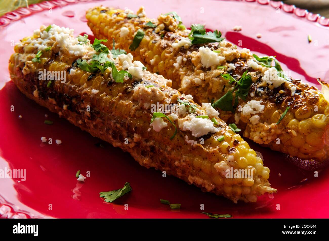 Mexican street corn also known as elote served with chili mayonnaise ...