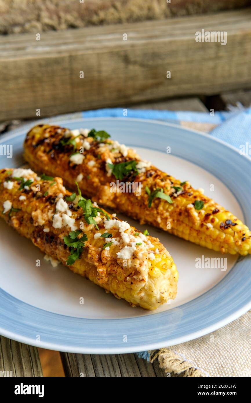 Mexican street corn also known as elote served with chili mayonnaise ...