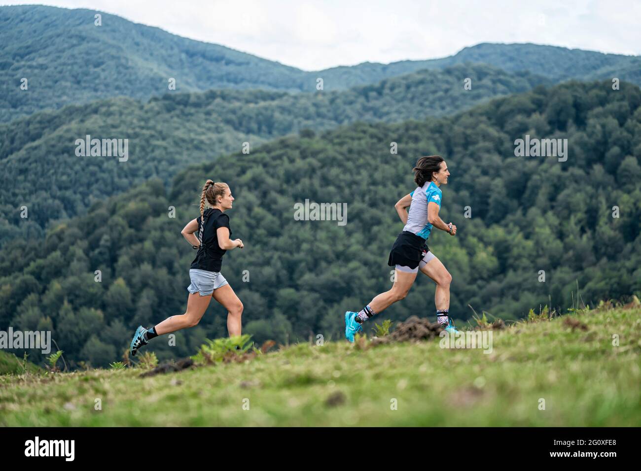 Man Running Along Mountain Trail High Resolution Stock Photography and ...