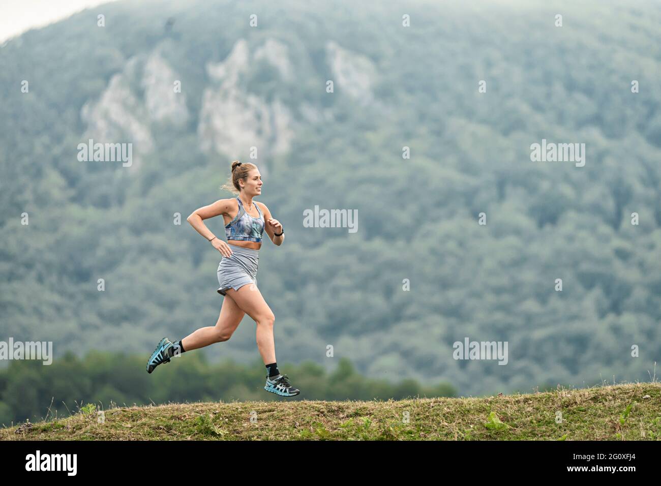 Girl running on trail, traveling through beautiful and beautiful ...
