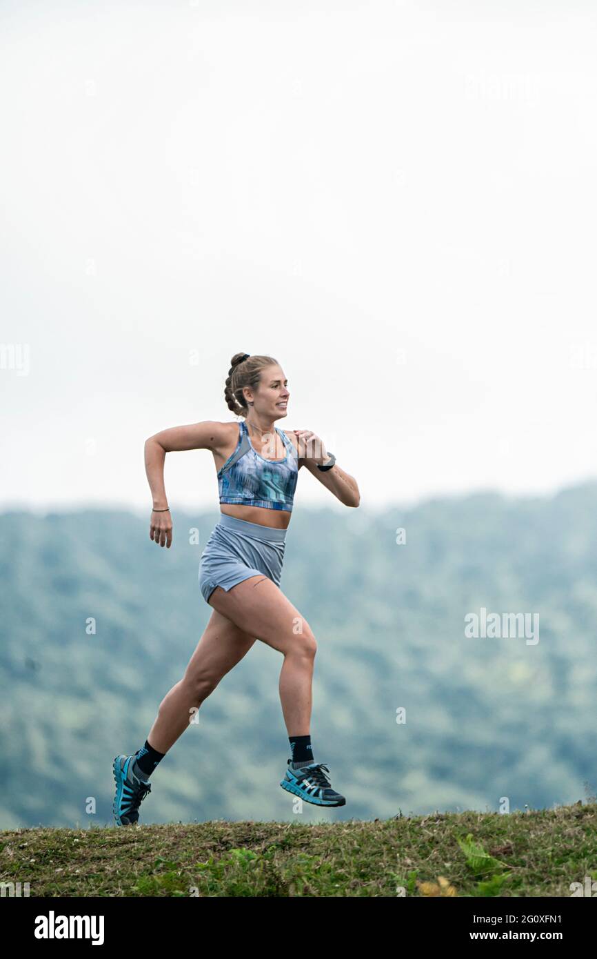 Girl running on trail, traveling through beautiful and beautiful ...