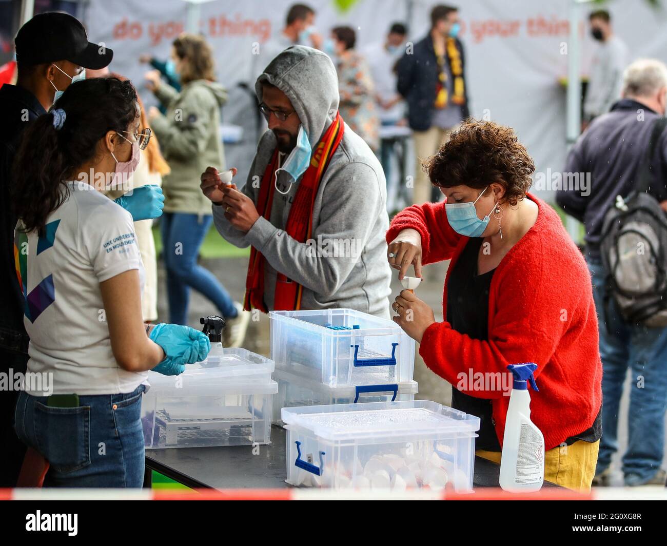 Illustration picture shows people taking a self-test, during a test ...