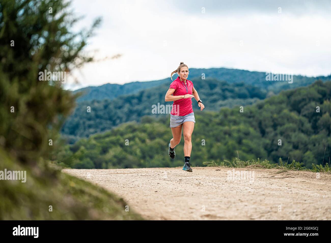 Girl running on trail, traveling through beautiful and beautiful ...