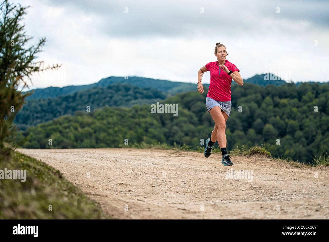 Girl running on trail, traveling through beautiful and beautiful ...