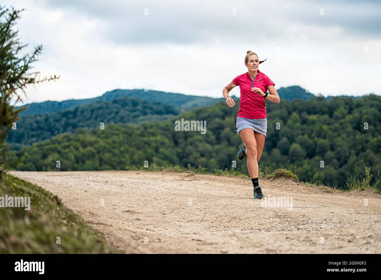Girl running on trail, traveling through beautiful and beautiful ...