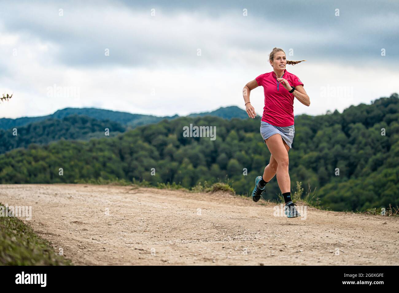 Girl running on trail, traveling through beautiful and beautiful ...