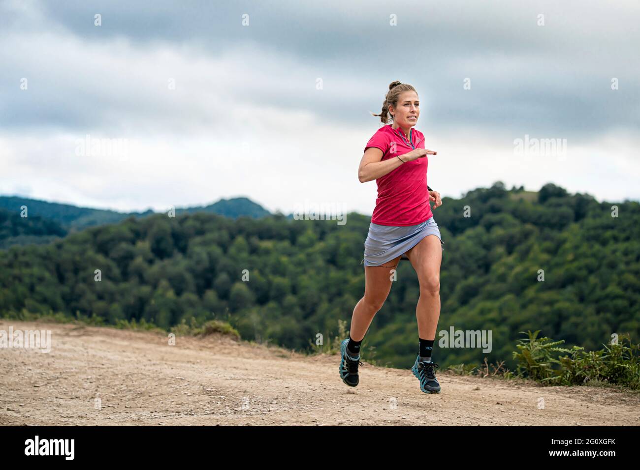 Girl running on trail, traveling through beautiful and beautiful ...