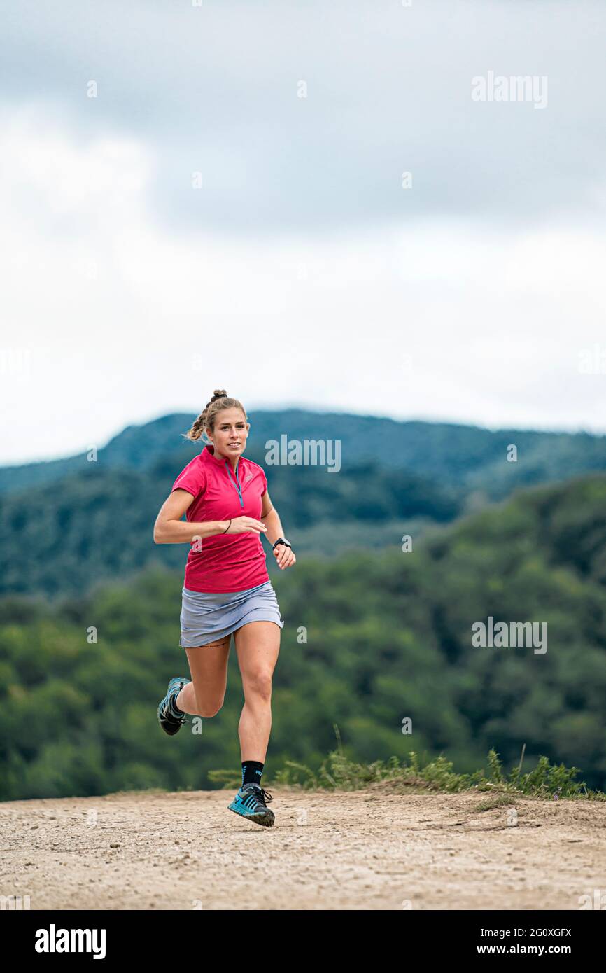 Girl running on trail, traveling through beautiful and beautiful ...