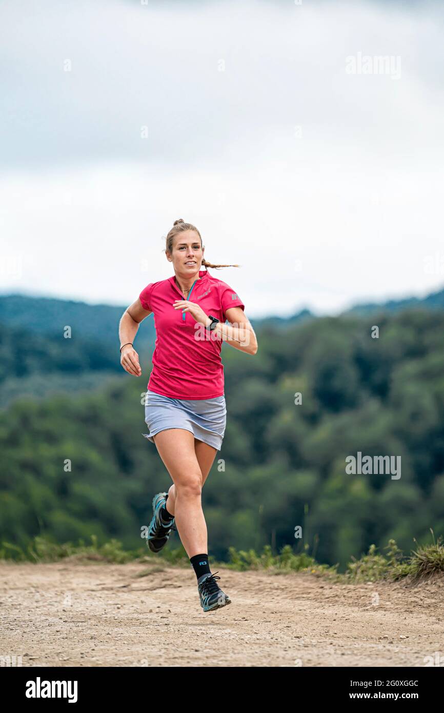 Girl running on trail, traveling through beautiful and beautiful ...