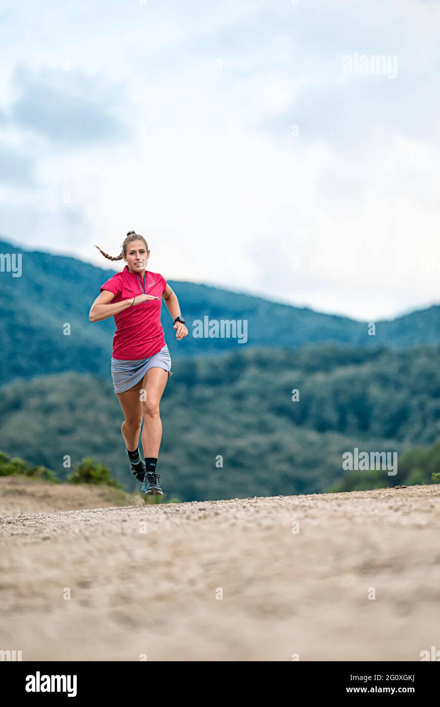 Girl running on trail, traveling through beautiful and beautiful ...