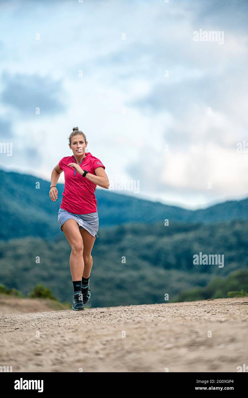Girl running on trail, traveling through beautiful and beautiful ...