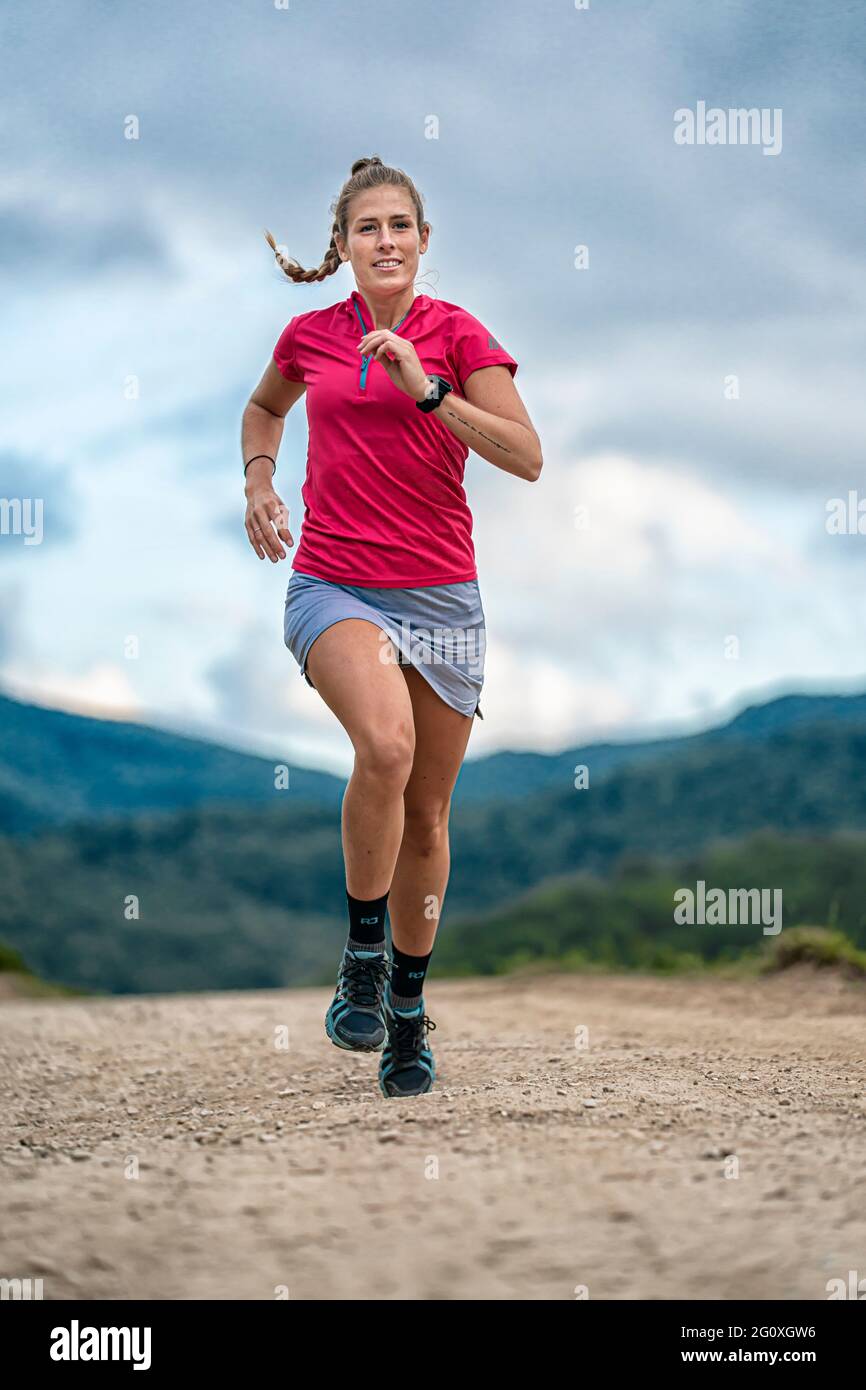 Girl running on trail, traveling through beautiful and beautiful ...
