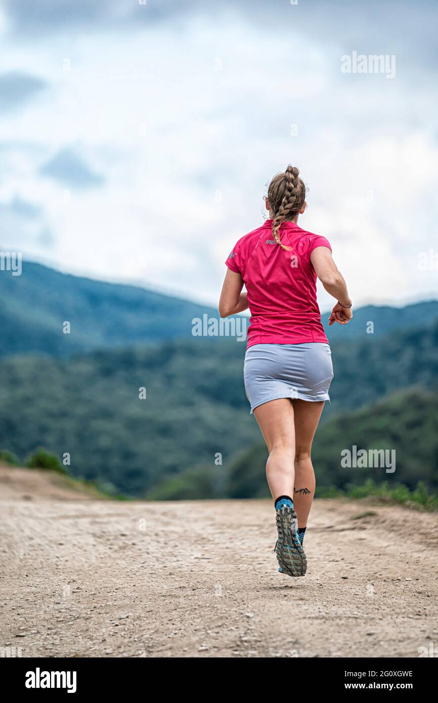 Girl running on trail, traveling through beautiful and beautiful ...