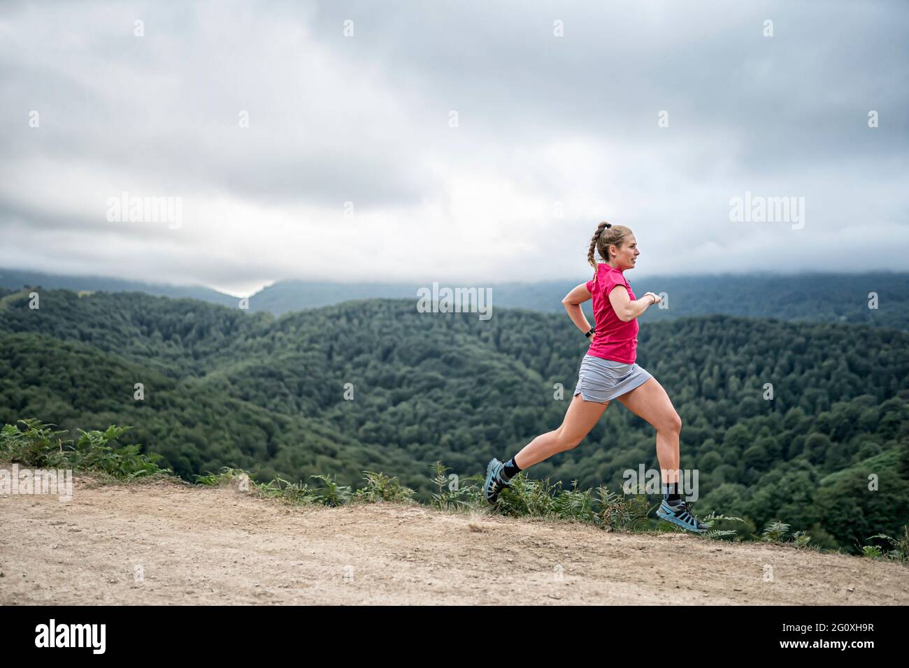 Girl running on trail, traveling through beautiful and beautiful ...