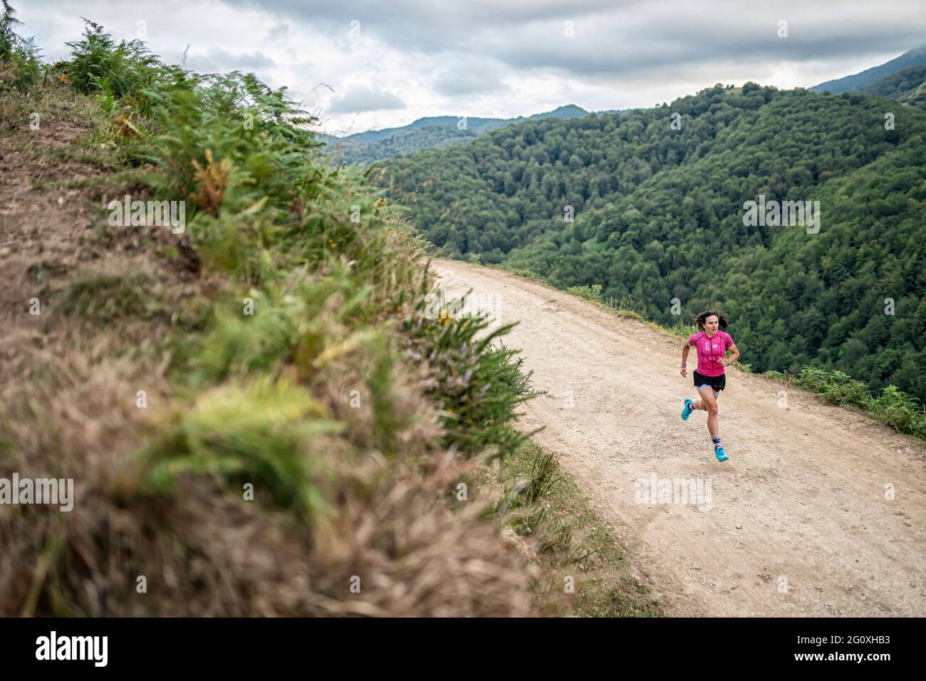 Girl running on trail, traveling through beautiful and beautiful ...