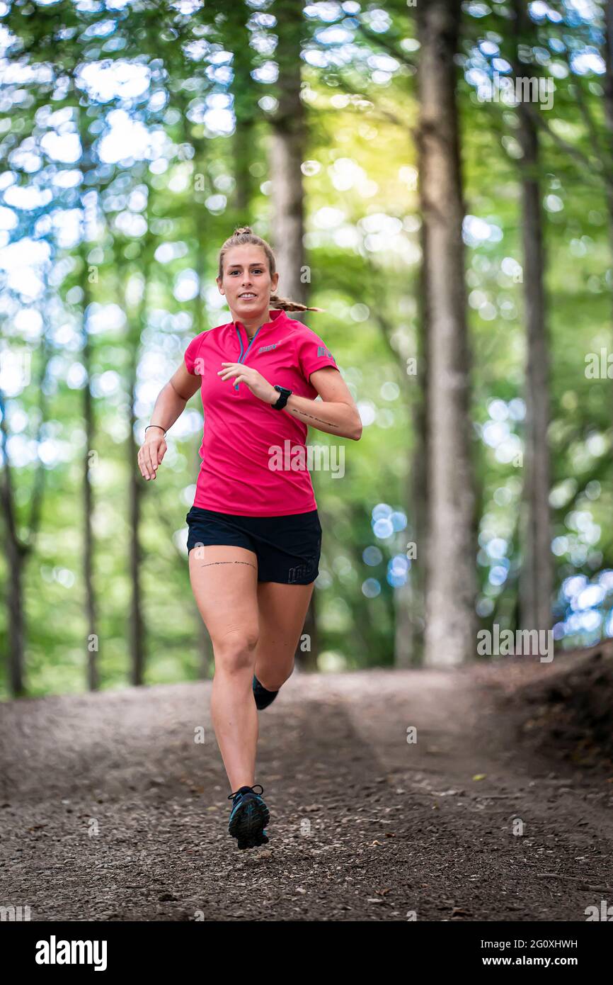 Girl running on trail, traveling through beautiful and beautiful ...