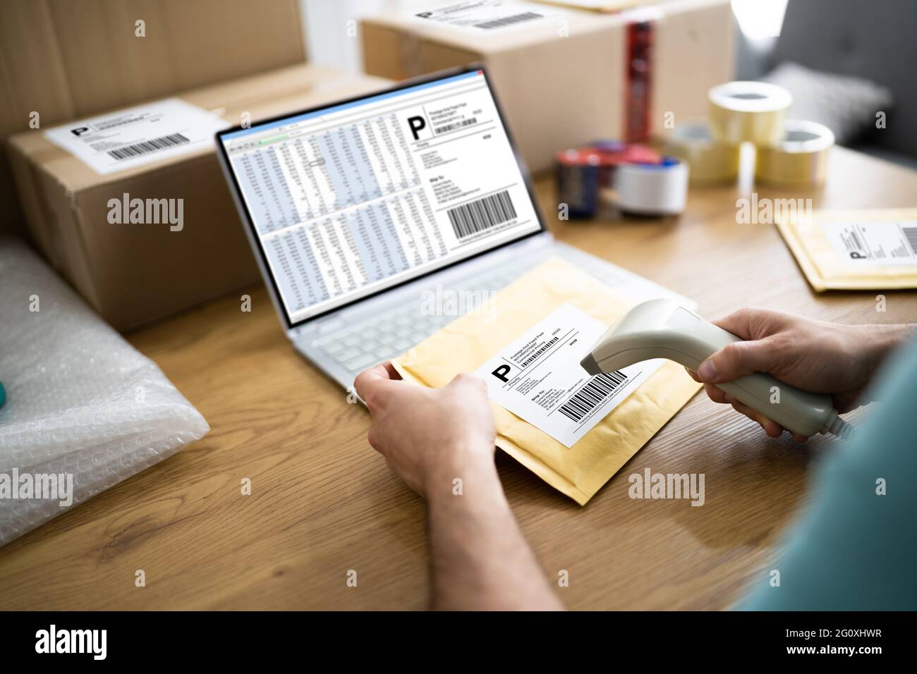 Person Packaging Orders For Online Business And Using Barcode Scanner ...