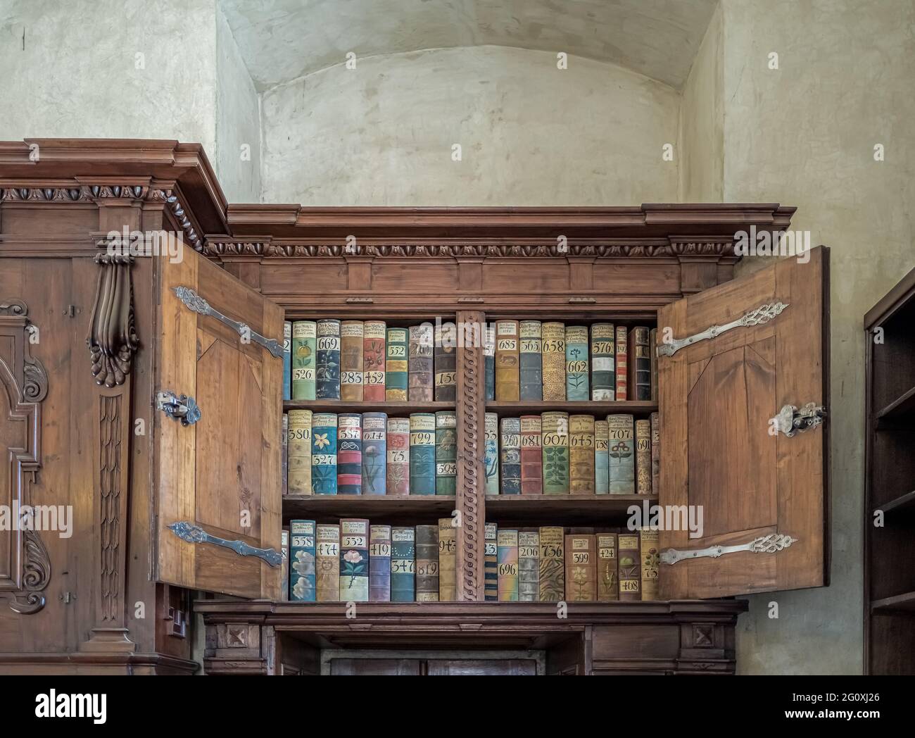 Medieval bookshelf with old books in the Old Royal Palace - Prague ...