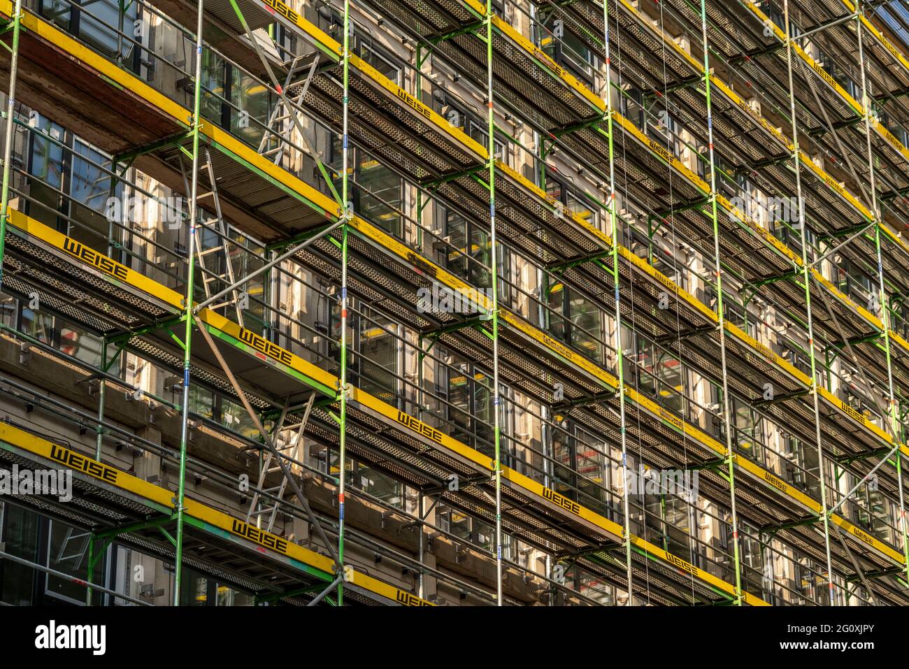 Scaffolding high rise building new construction hi-res stock ...
