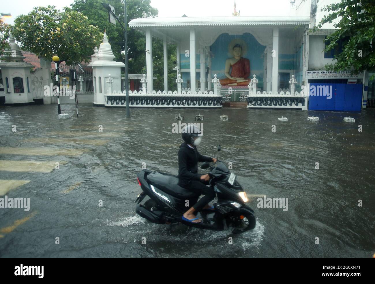 Colombo, Sri Lanka. 3rd June, 2021. A person rides a motorcycle on a ...